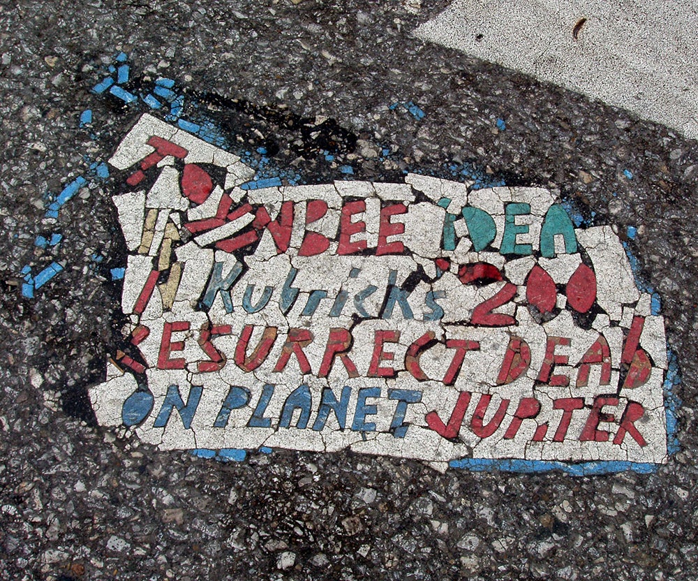 Uncover the mystery of the strange, bizarre Toynbee Tiles | Roadtrippers